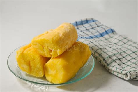 Three Pieces Of Tapai Or Fermented Cassava On A Small Plate And A