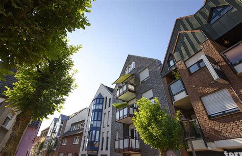 Rotthäuser Architekten Mehrfamilienhaus mit barrierefreien Wohnungen und einem Ladenlokal