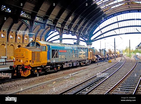 Class 37401 Mary Queen Of Scots At Rear Of Rail Head Treatment Train At