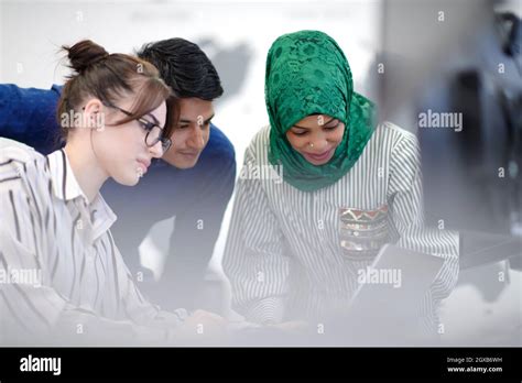 Multiethnic Startup Business Team Arabian Woman Wearing A Hijab On
