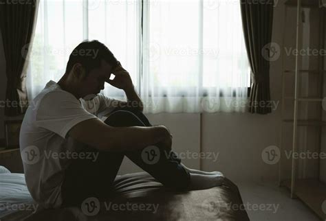 Silhouette Depressed Man Sadly Sitting On The Bed In The Bedroom Sad