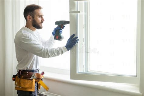 Service Man Installing Window With Screwdriver Stock Photo Image Of Installation Apartment
