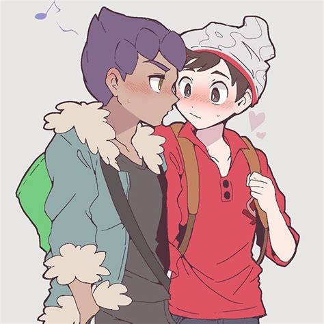 Two People Standing Next To Each Other And One Is Kissing The Others Cheek