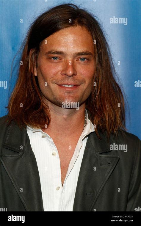 Christopher Backus Attending The Beatles Love 10th Anniversary