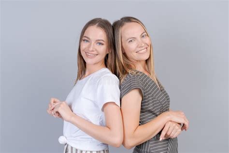 Close Up Photo Amazing Cute Two People Mom And Daughter Stand Hugging