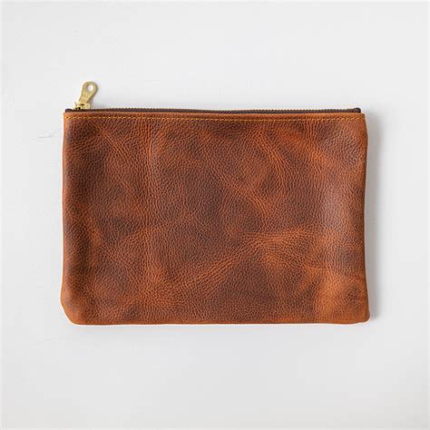 Tan Kodiak Medium Zip Pouch Leather Clutch Bag At Kmm And Co