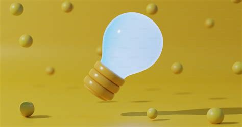 전구는 노란색 배경에 공으로 둘러싸여 있습니다 사진 Unsplash의 식물 이미지