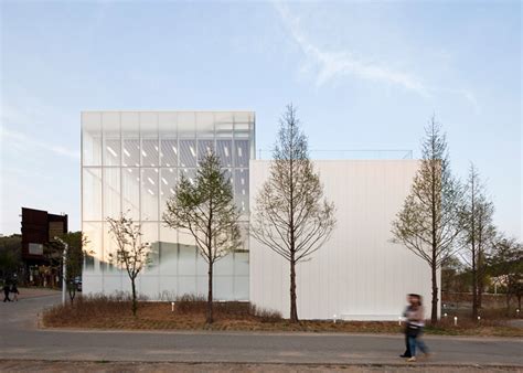 White Block Gallery By Ssd Features Fritted Glass Facades