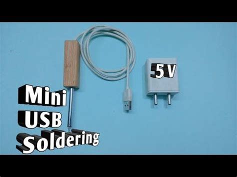 The Mini Usb Soldering Kit Is Set Up On A Blue Surface With Wires And Plugs