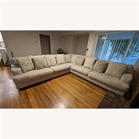 Ashley Rawcliffe 3 Piece Sectional Aptdeco