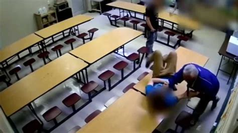 Video Teacher Grabs Student By Throat Slams Him Onto Cafeteria Table