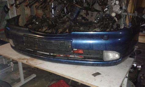 NISSAN PRIMERA P LIFT ZDERZAK PRZOD XENON Z Oficjalne Archiwum Allegro