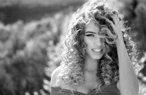 Blonde Girl With Long And Curly Wavy Hair Beautiful Model With Curly