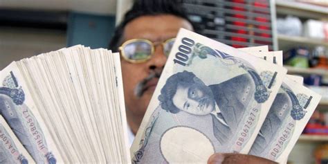 Japan Says No Contradiction Between Yen Intervention And Boj Policy