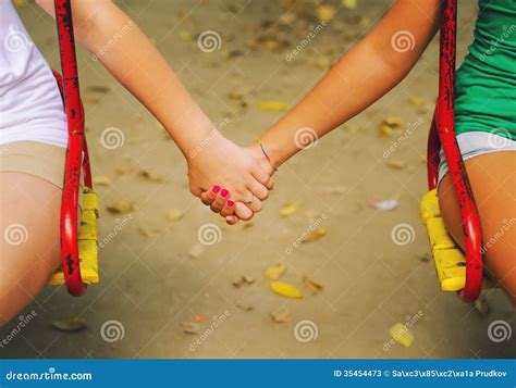 Two Teenage Girls Holding Hands Stock Image Image Of Fall Friendship