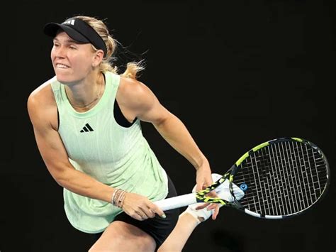 Tennis Moves On As A Disappointed Caroline Wozniacki Sucks Her Teeth
