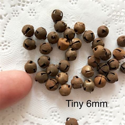 10 Mm 48 Rusty Look Tin Jingle Bells Primitive Crafts Rustic Etsy