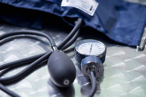 Close Up Of Tensiometer Over A Metallic Table Medical Concept Stock
