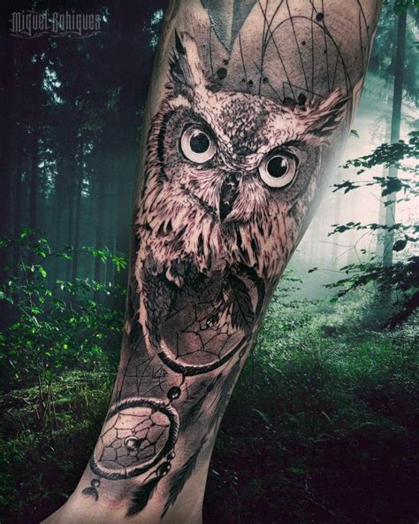 Black And Grey Owl Portrait Tattoo Located On The Shin