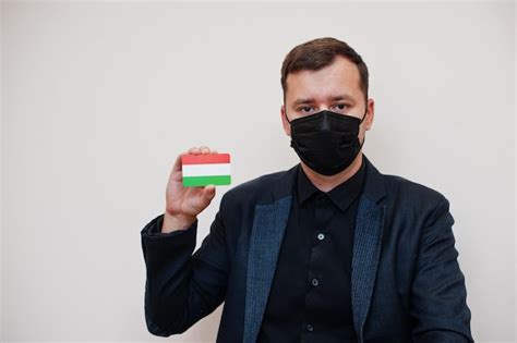 Free Photo European Man Wear Black Formal And Protect Face Mask Hold