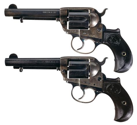 Collectors Set Of A Pair Of Colt Lightning Model 1877 Double Action
