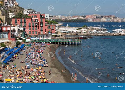 View Over One Of The Beautiful Beaches With Houses Touching The