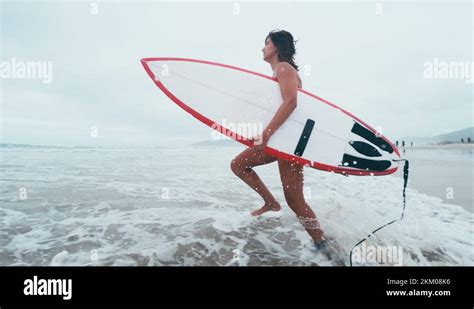 Surfer Girl Young Woman Surfer In Bikini Runs On The Beach With Surf Board Stock Video Footage