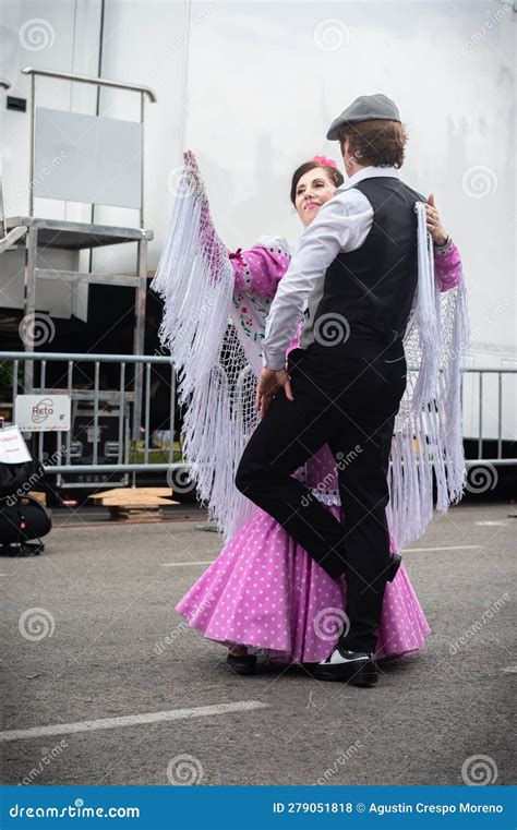 Adult Couple Dancing Chotis And Pasodobles Dressed In The Typical And
