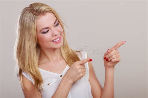 Woman Showing Copy Space Pointing With Finger Stock Image Image Of