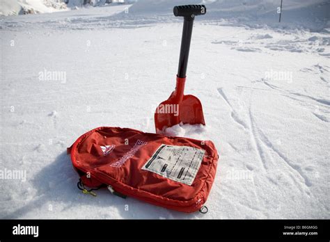 A First Aid Rescue Pack And A Spade For Digging Survivors From A Snow