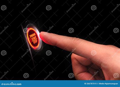 The Driver S Hand Is Pressing The Car Start Button Concept Of Transportation And Technology