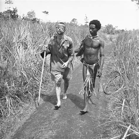 Orokaiva Man Raphael Oimbari Leads Australian Soldier George C Dick