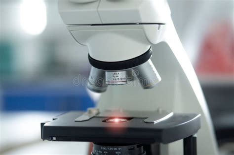 Closeup Of A White Microscope In A Laboratory Setting Stock Image
