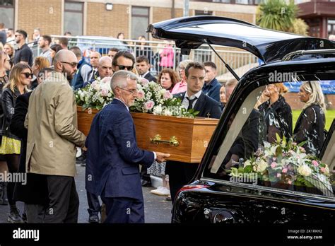 The Coffin Of Hollie Thomson Is Placed Into The Hearse After Her