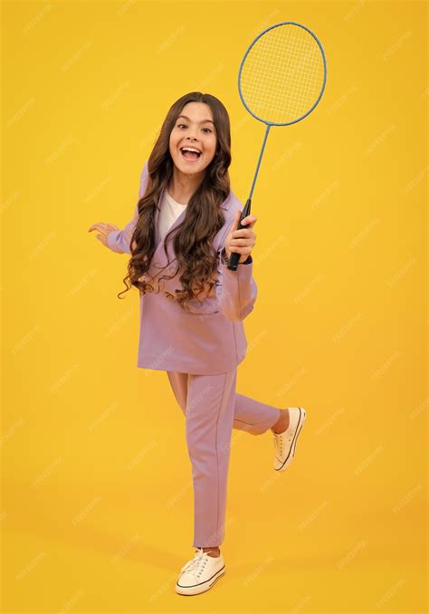 Premium Photo Teen Girl Badminton Player In Suit With Badminton
