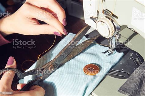 Woman Tailor Using Retro Sewing Machine At Home Hobby Concept Stock