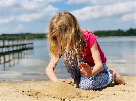 Premium Photo Full Length Of Girl At Beach Against Sky