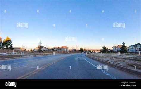 Driving On Typical Paved Roads In A Suburban Upscale Residential Neighborhood Of America Stock