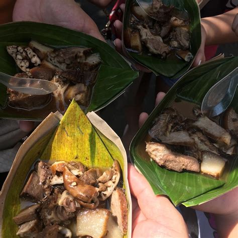Premium Photo Close Up Of Hand Holding Leaves