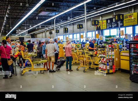 Long Line Up At A Supermarket Checkout Line View From The Side Stock