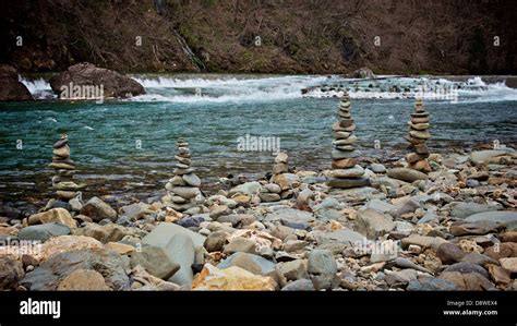 Pebble Cairn Balancing Towers By Gushing River At Dakigaeri Senboku