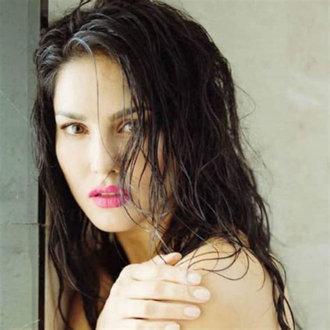 Sunny Leone Poses Inside Pool In Blue Bikini