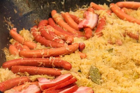 Cooking Of Traditional German Dish Sauerkraut Sour Cabbage In