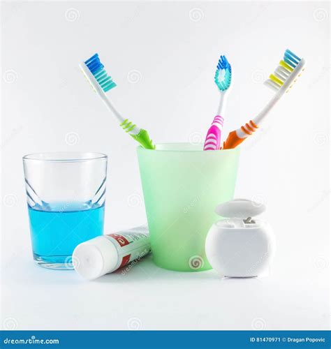 Multicolor Toothbrushes Dental Floss Toothpaste And Mouthwash On White Background Stock Image
