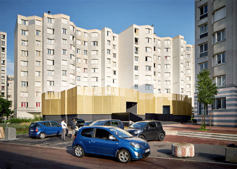 Cut Architectures Adds Golden Walls To A Community Centre