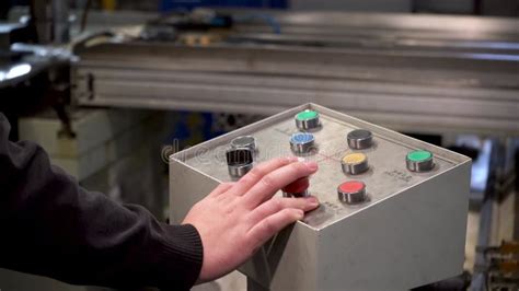 hands on the control panel of a hydraulic press stock video video of