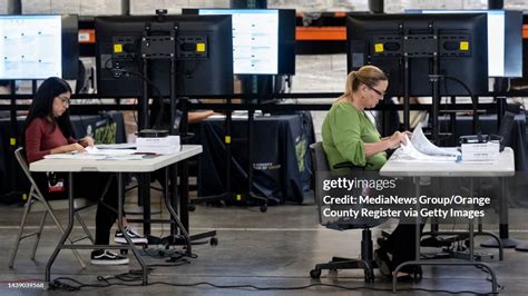 Employees Check For Duplicate Ballots At The Orange County Registrar