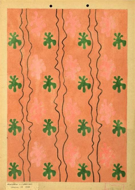 An Orange Background With Green And Pink Flowers On The Bottom Right