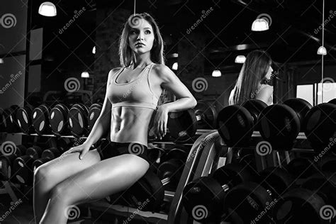 Beautiful Woman With Perfect Abdominal Muscles At The Gym Stock Image