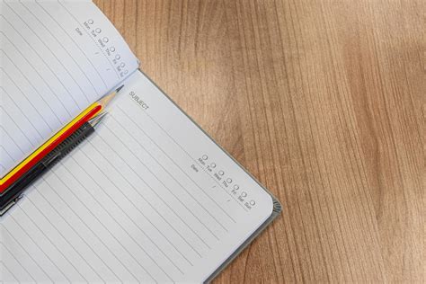 Notebooks With Pencil And Pen On The Table Stock Photo At Vecteezy